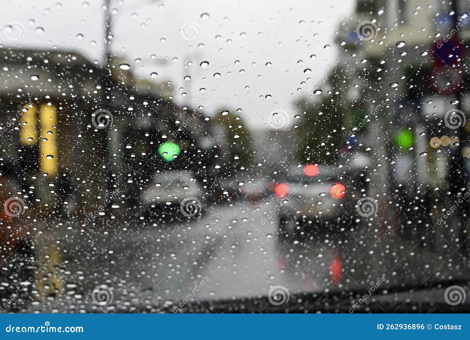 Driving on a rainy day stock photo. Image of drive, rainy - 262936896