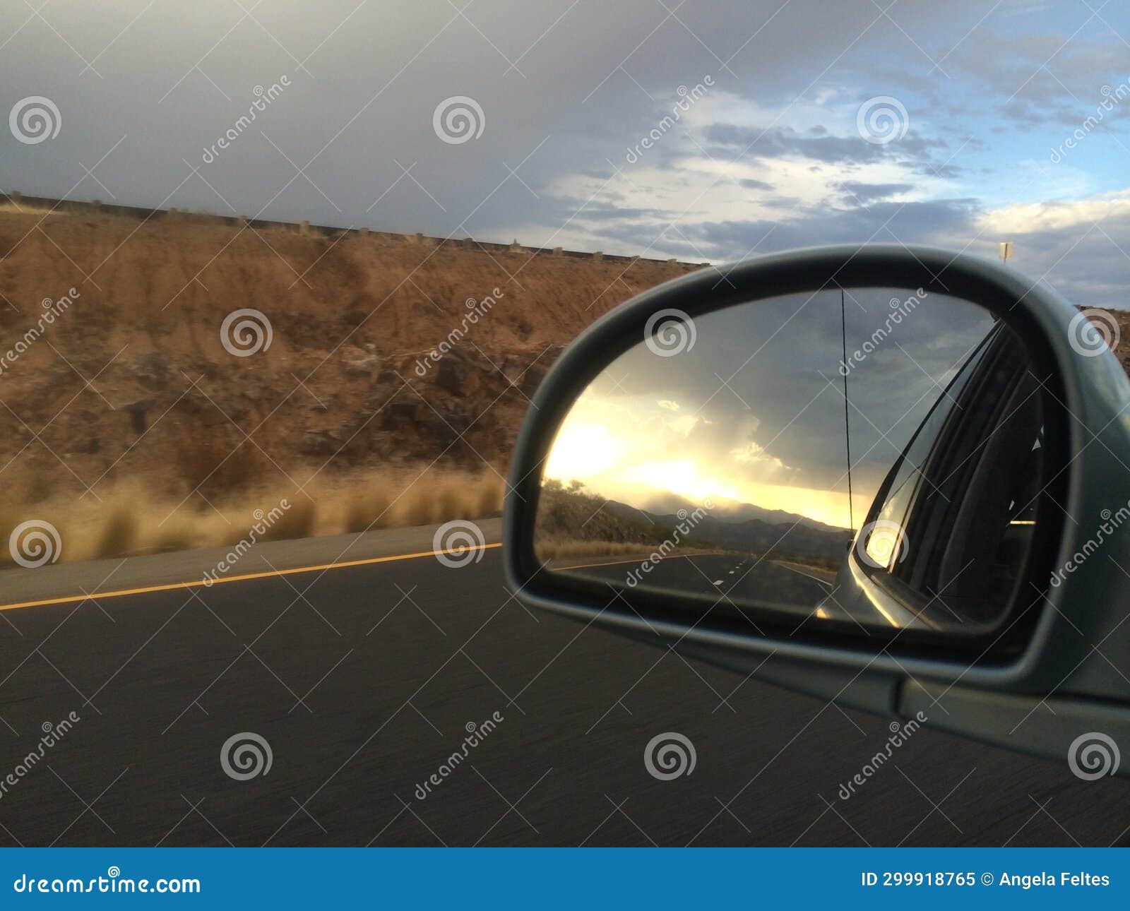Driving Rear View Side Mirror Looking at the Sunset Stock Image - Image ...