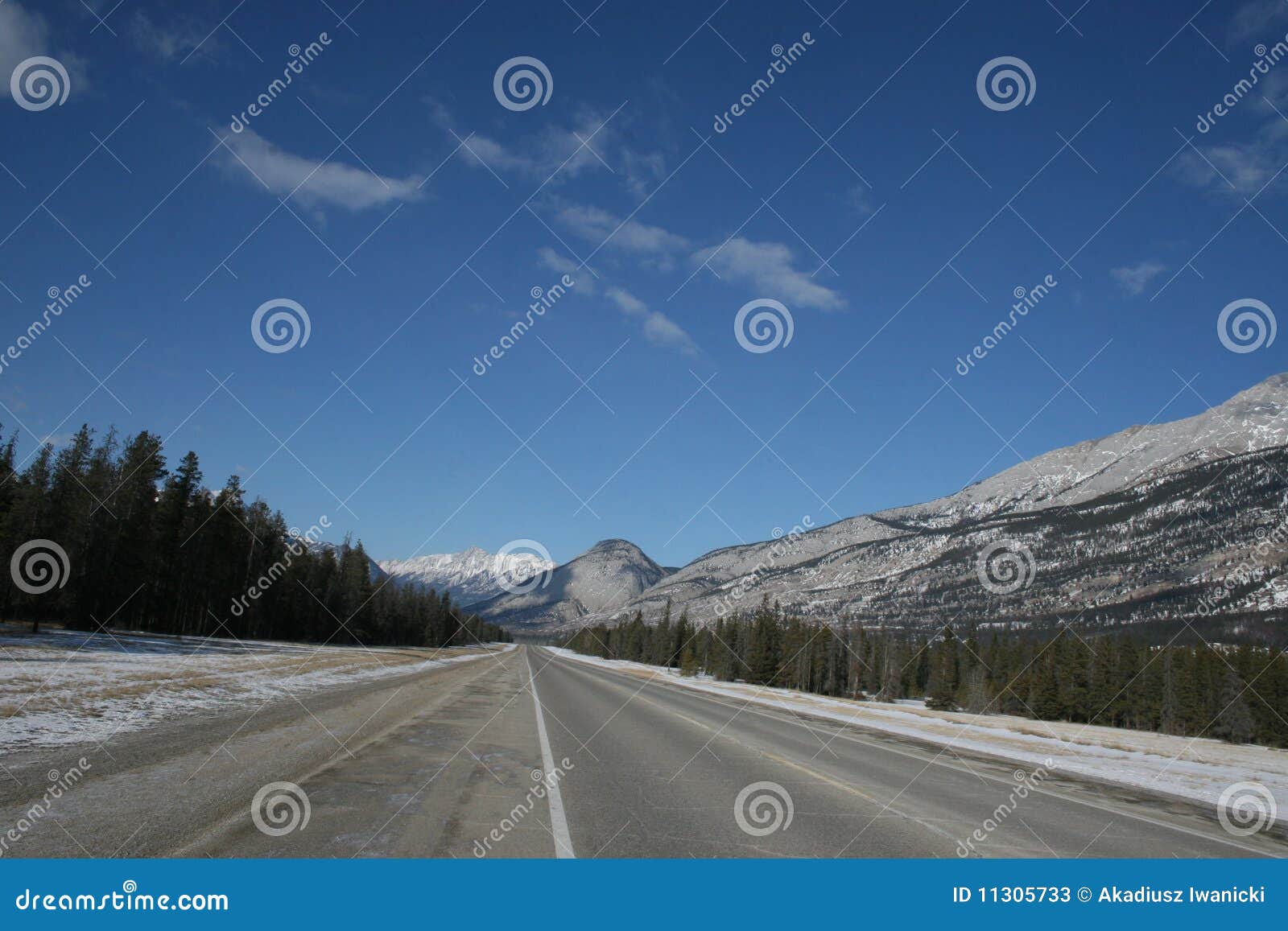 Driving in Rocky Mountains Range Stock Image - Image of road, mountains ...