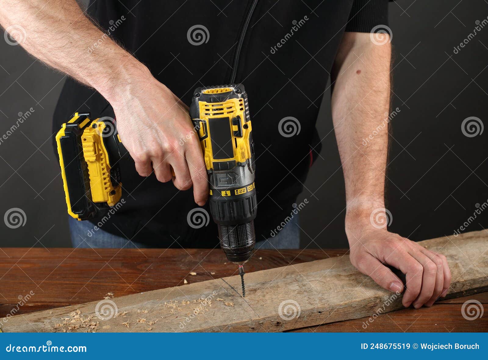 Driving Screws with a Screwdriver Stock Image - Image of board ...