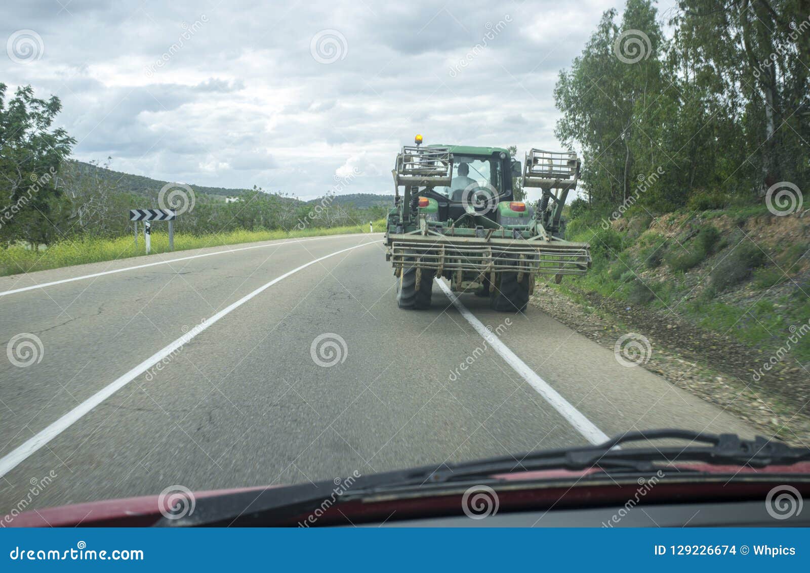 Driving Slowly Behind a Tractor by Local Rural Road Editorial Stock ...