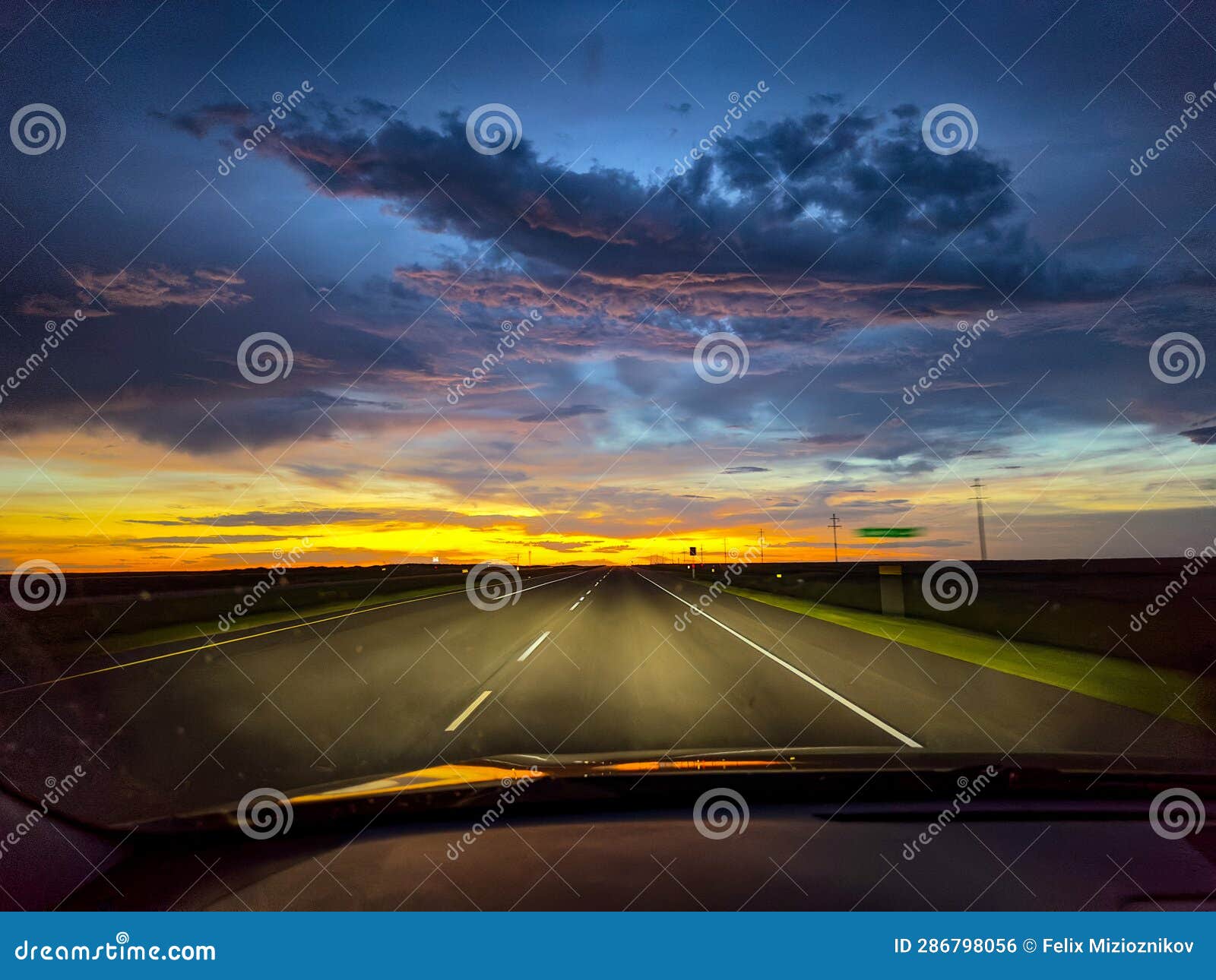 Driving into the Sunset Photo Stock Photo - Image of glow, destination ...
