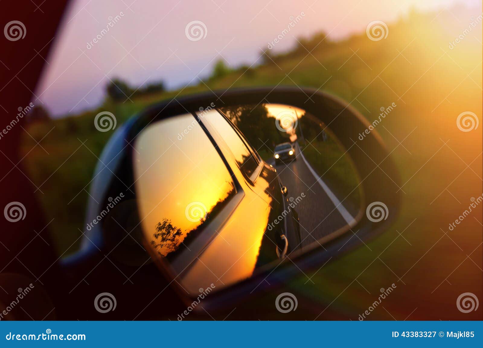 Driving at Sunset - Rear View Mirror Stock Image - Image of rear ... Driving at Sunset - Rear View Mirror Stock Image - Image of rear ...