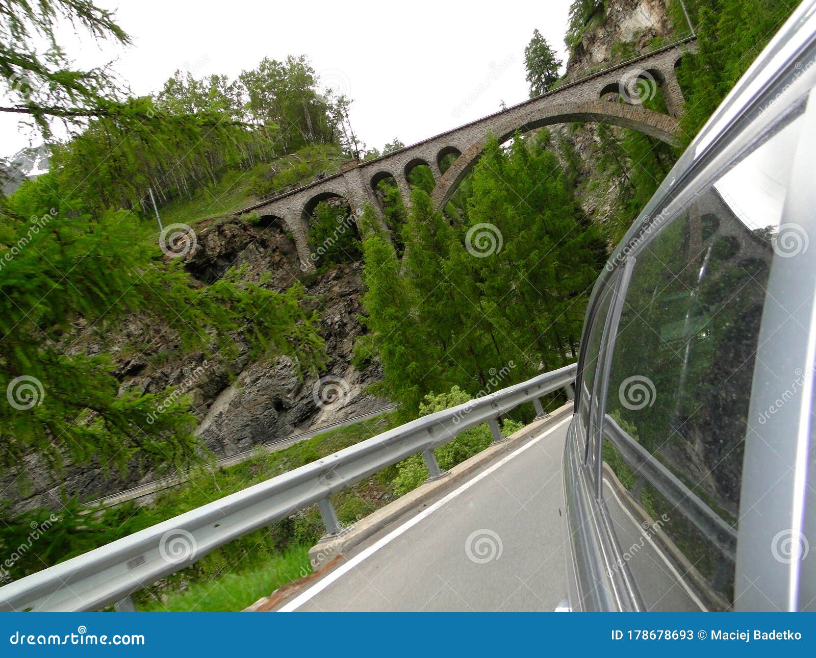 Driving in Swiss Mountains - Side of Car and an Arch Bridge Stock Image ...