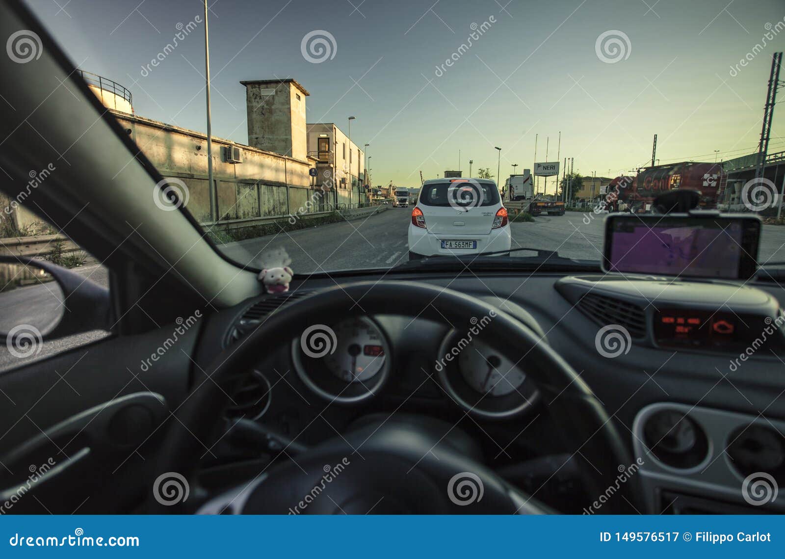 Driving in the traffic editorial photography. Image of light - 149576517