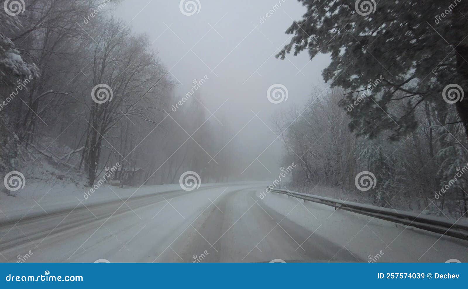 Driving Winter Snow Road. View through the Windshield on the Highway in ...