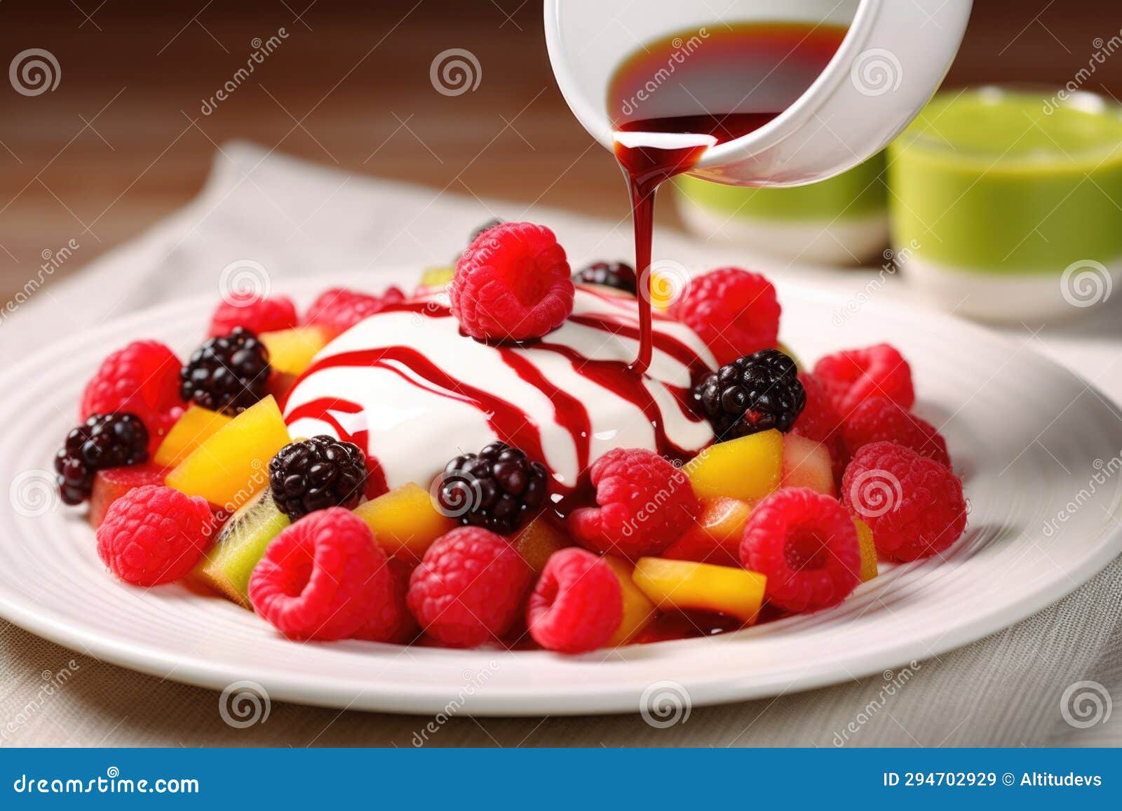 Drizzle a Raspberry Sauce Onto a Fruit Salad Stock Image - Image of ...