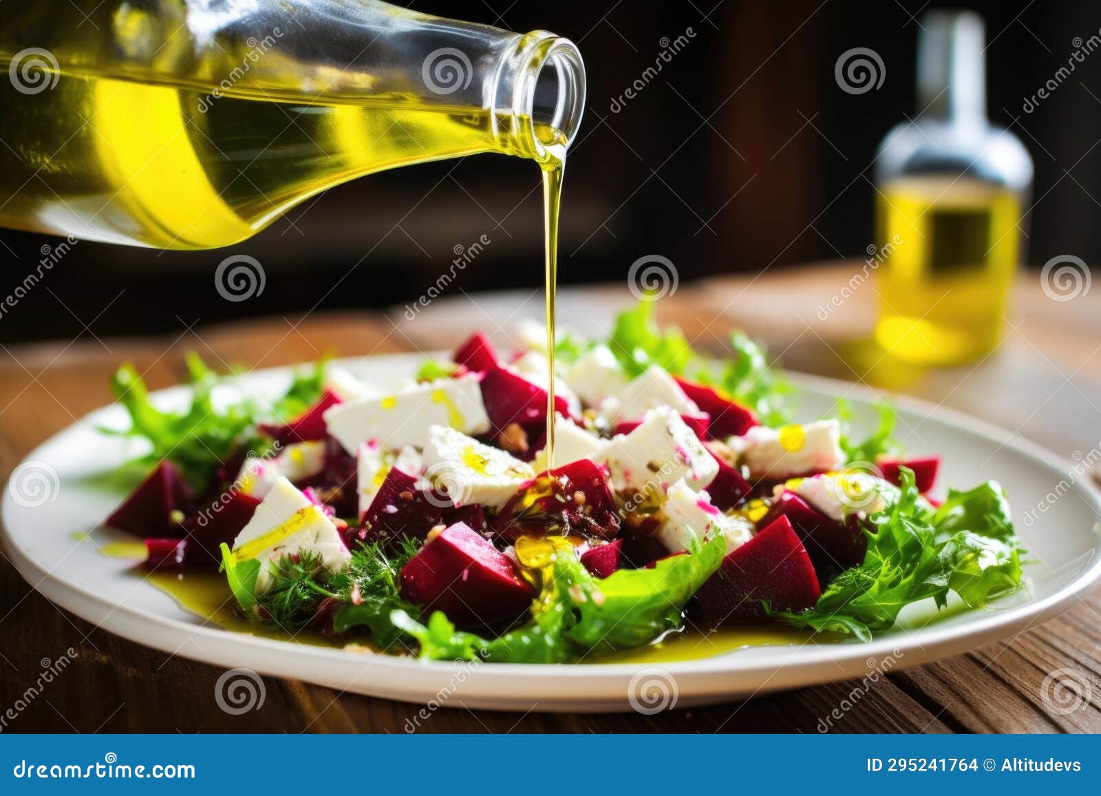 Drizzling Olive Oil Over Beet Salad Stock Photo - Image of salad, food ...