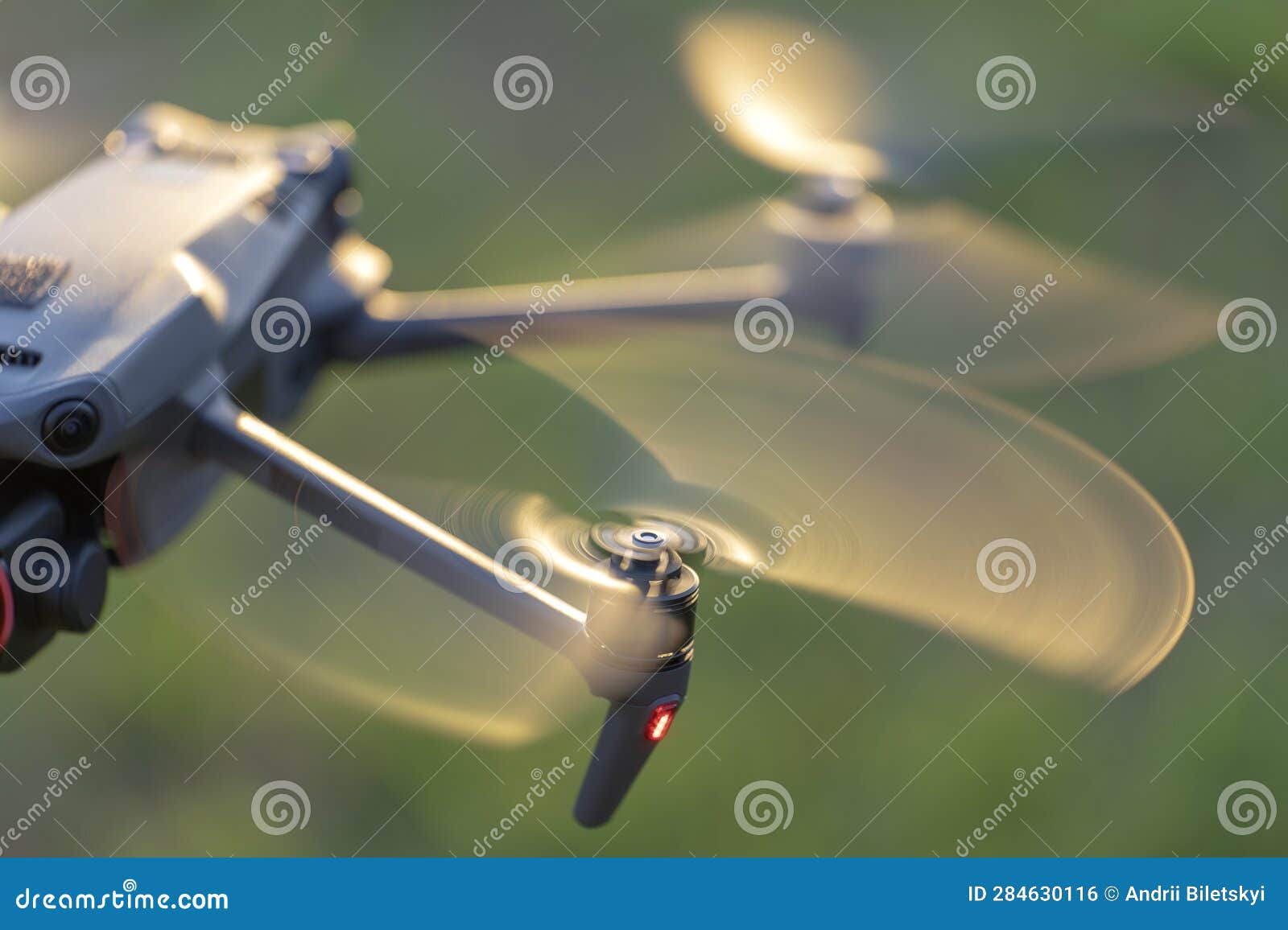 Drone Aircraft with Blurred Fast Rotating Propellers and Video Camera ...