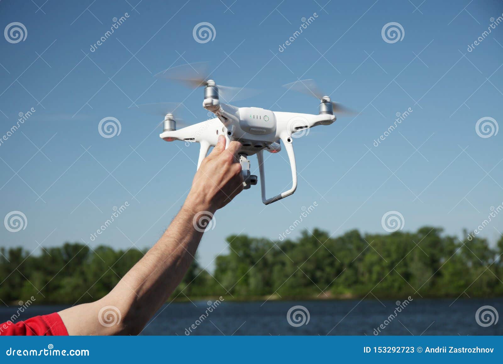 Drone on Blue Sky Background. Remote Control Quadrocopter with Camera ...