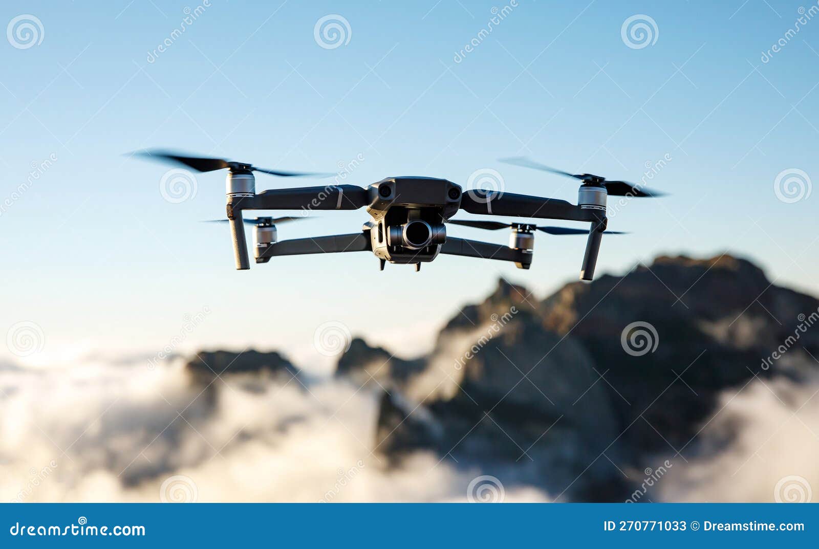 Drone with Camera Flying Over the Mountains. Stock Image - Image of ...