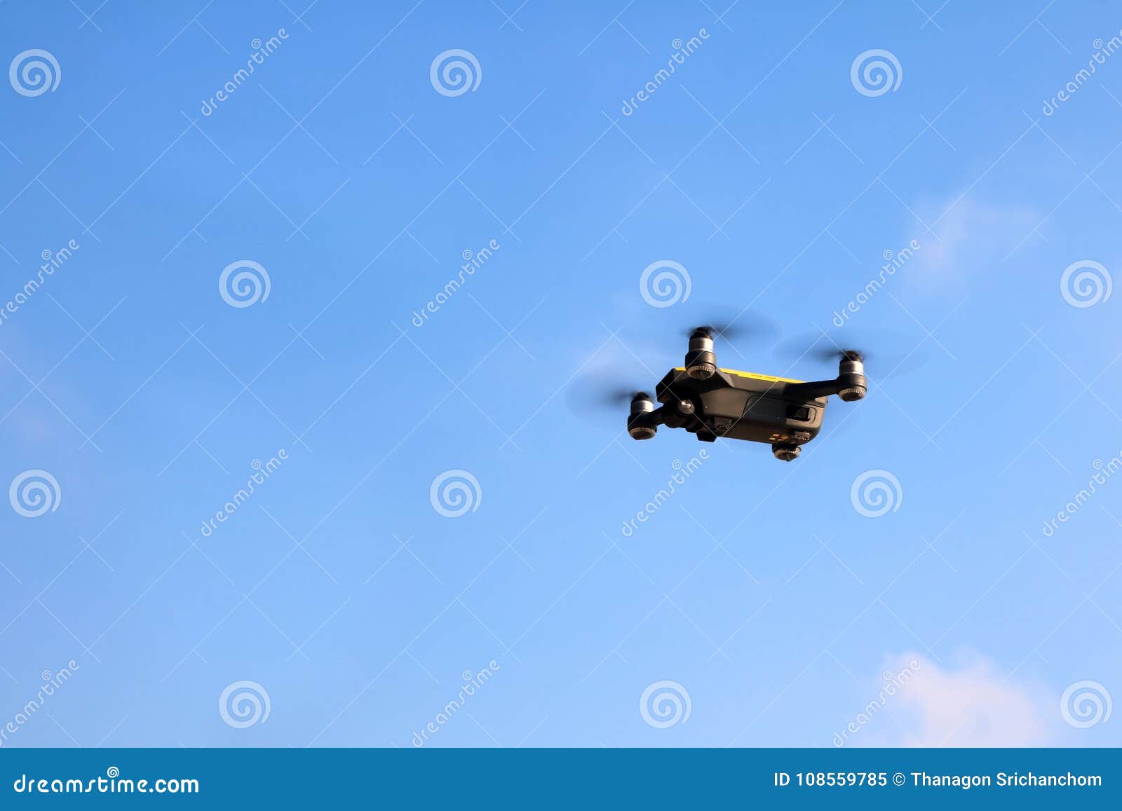 Drone Camera or UAV Flying in the Blue Sky Stock Image - Image of drone ...