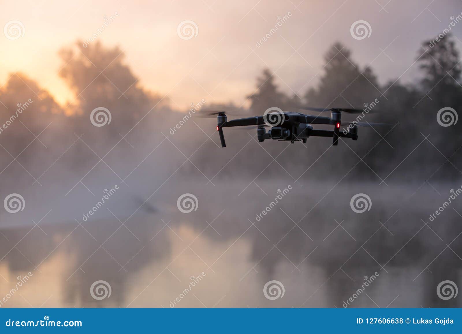 Drone Copter with Digital Camera, River on Background. Modern ...