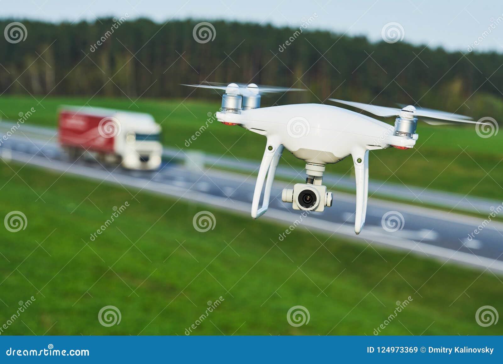 Drone and Transportation. Drone with Camera Controls Highway Road ...