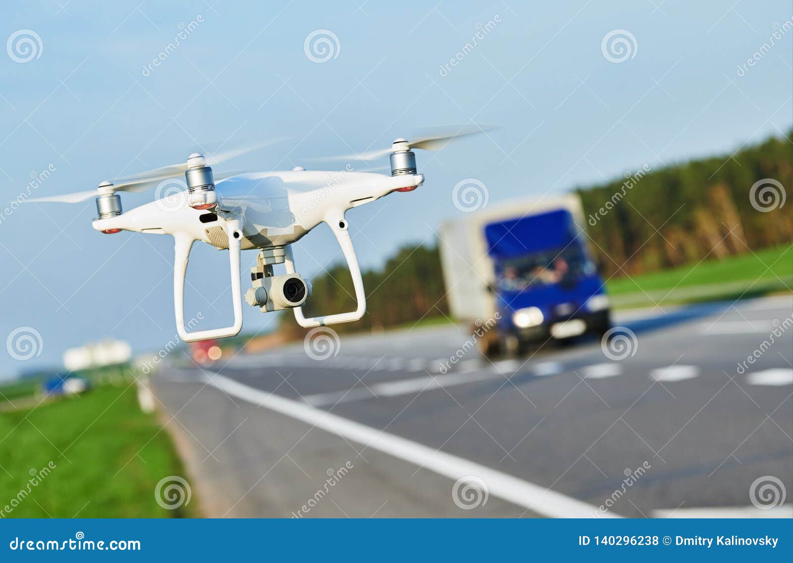 Drone and Transportation. Drone with Camera Controls Highway Road ...