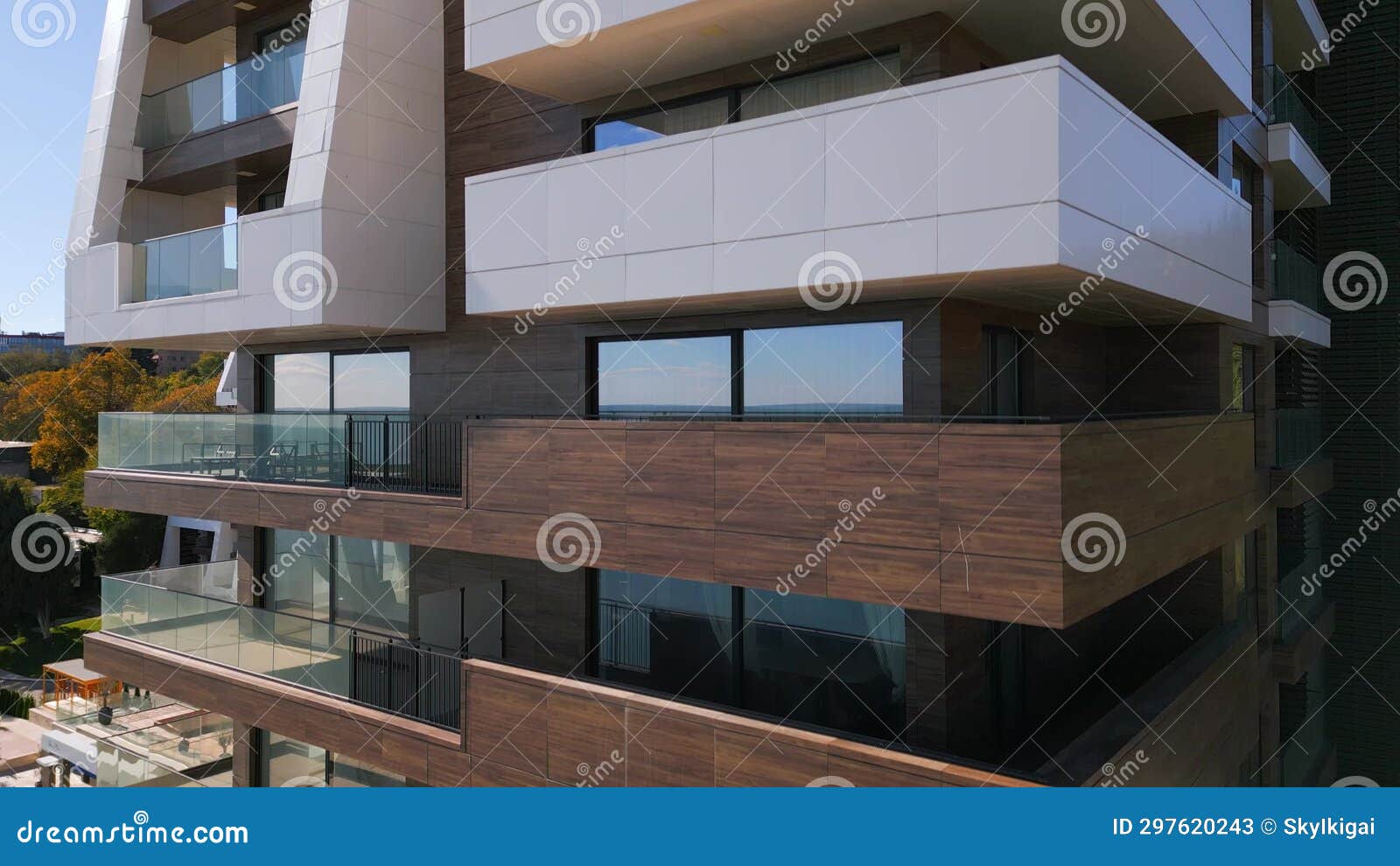 A Drone Flies Along the Facade of a Modern Hotel. Windows and Balconies ...