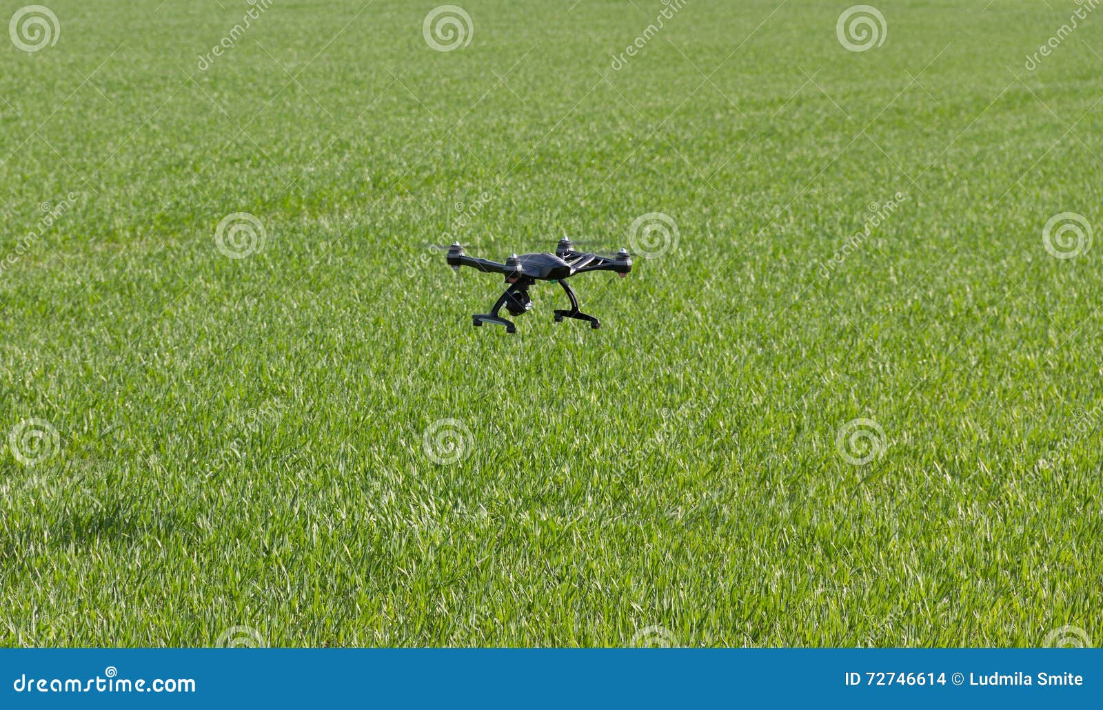Drone flying above field. stock photo. Image of control - 72746614