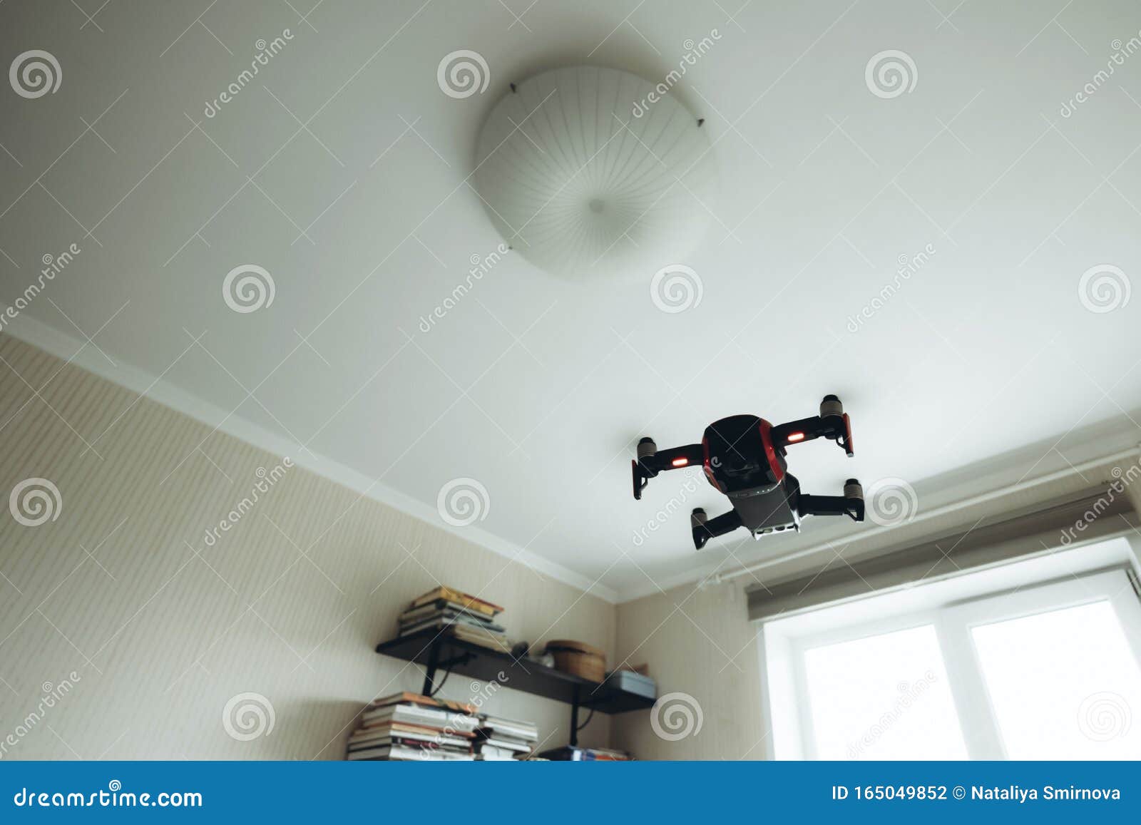 Drone flying indoors stock photo. Image of motion, helicopter - 165049852