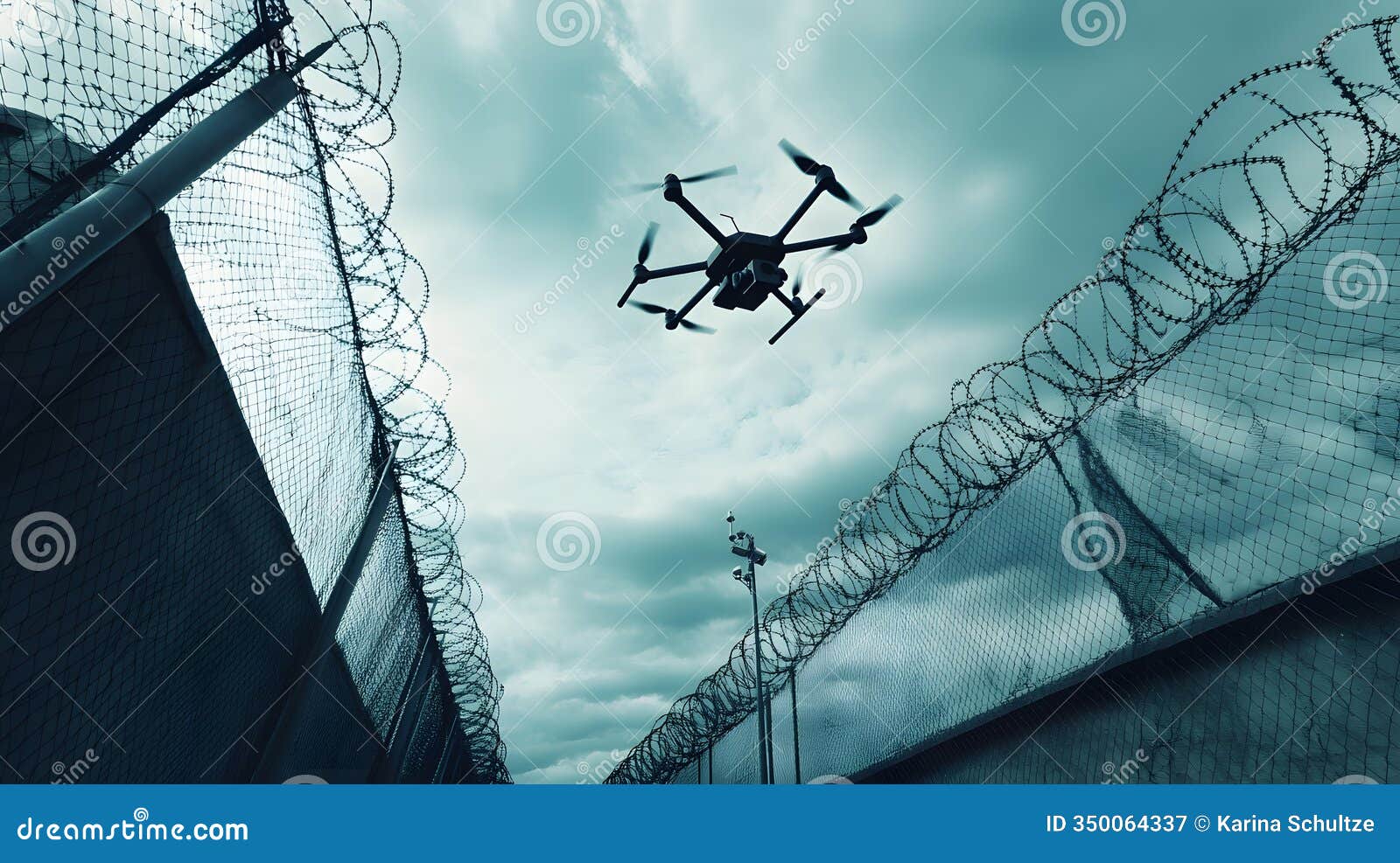 Drone Flying Over Prison Perimeter Fence with Barbed Wire Stock ...