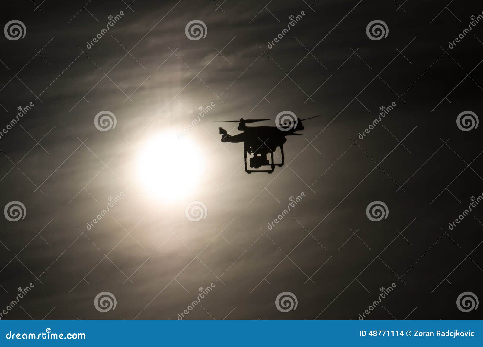 Drone flying into the sun stock photo. Image of chopper - 48771114