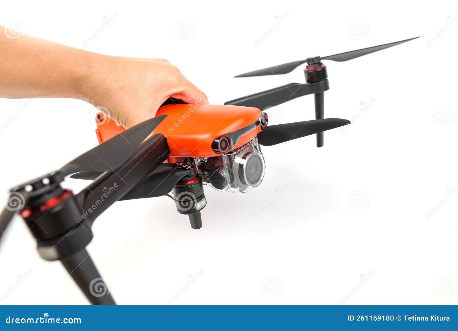 Drone in hand on a white stock photo. Image of quadcopter - 261169180