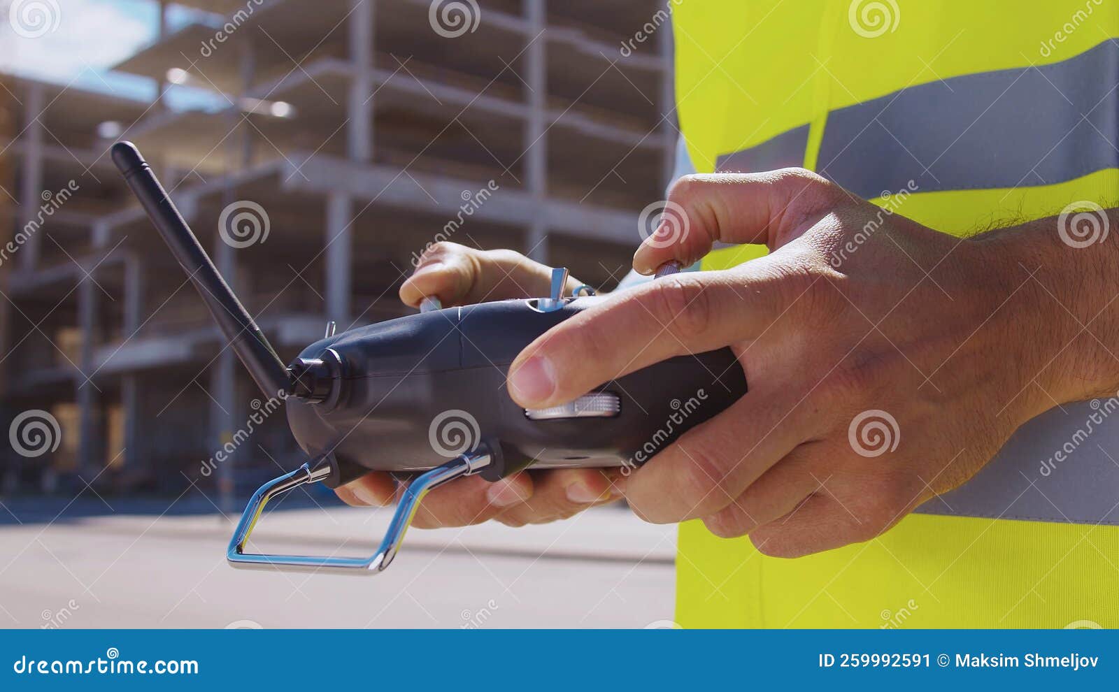 Drone Operator Holding Remote Controller. Professional Builder in ...