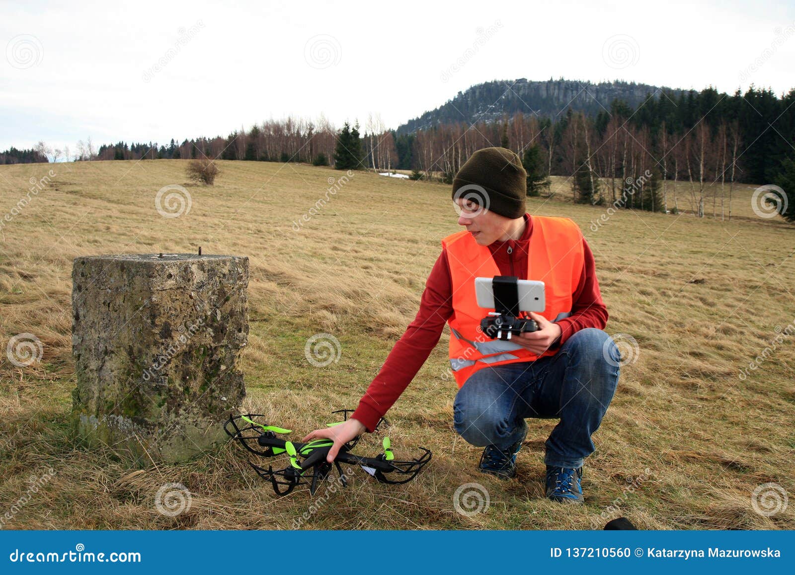Drone Operator, Top View Of Man Lying In Grass Field And Using Drone ...