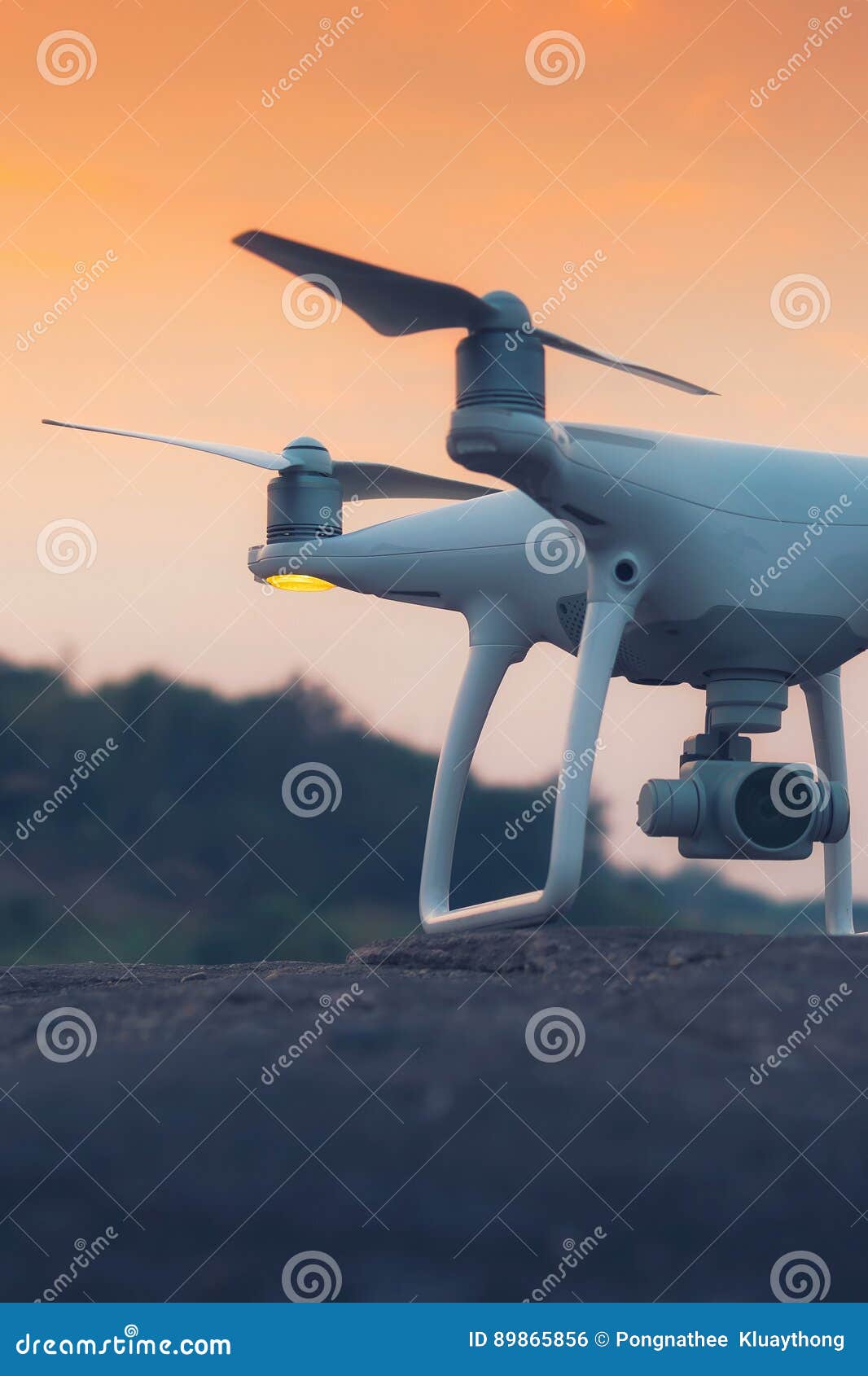 Drone Quad Copter with Digital Camera at Sunset Ready To Fly for Stock ...