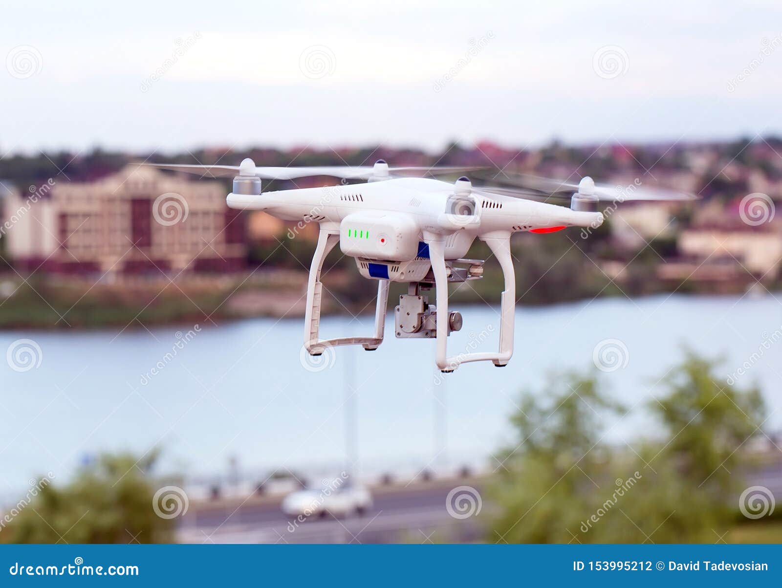 Drone Quad Copter with High Resolution Digital Camera Flying Hovering ...