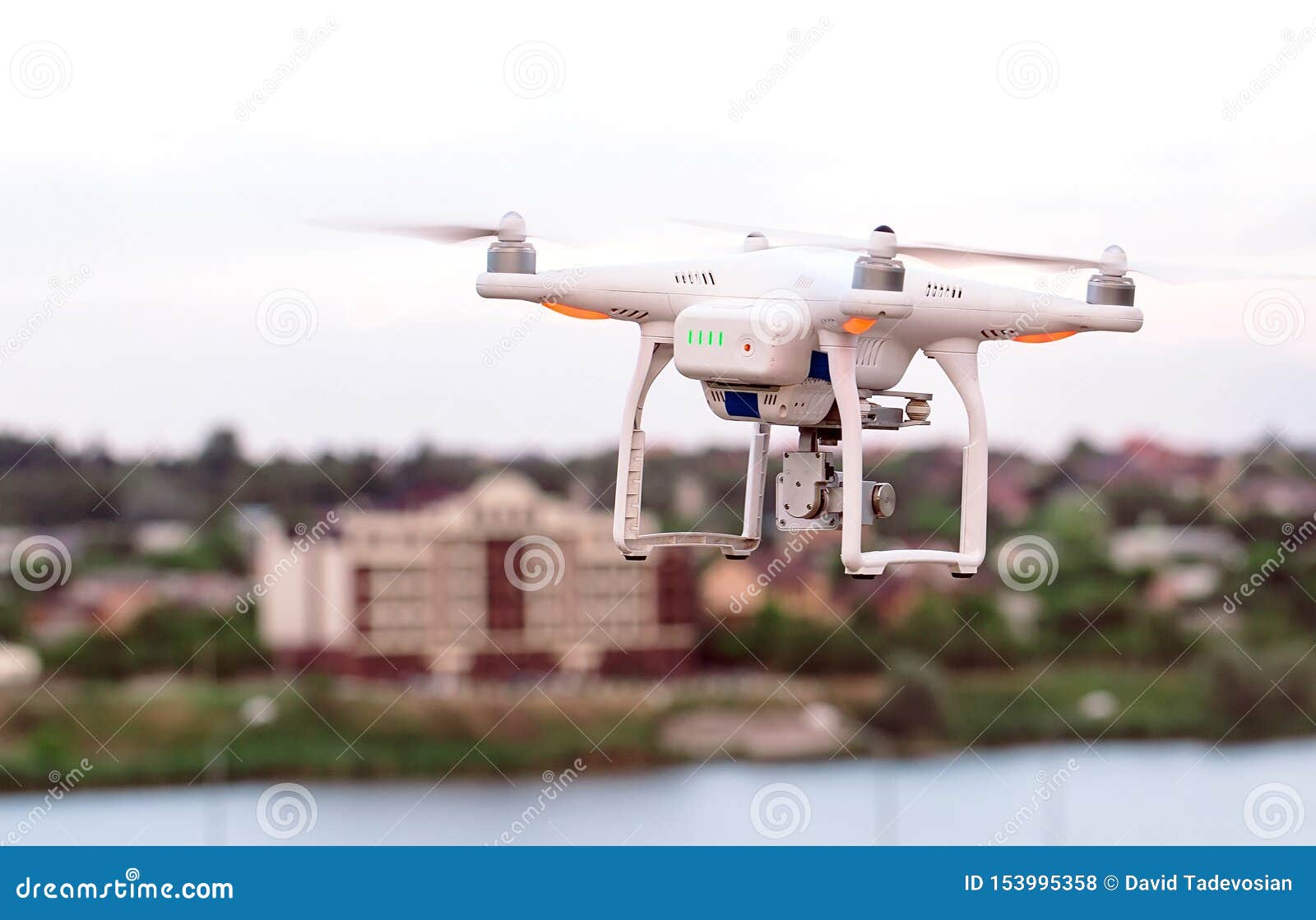 Drone Quad Copter with High Resolution Digital Camera Flying Hovering ...
