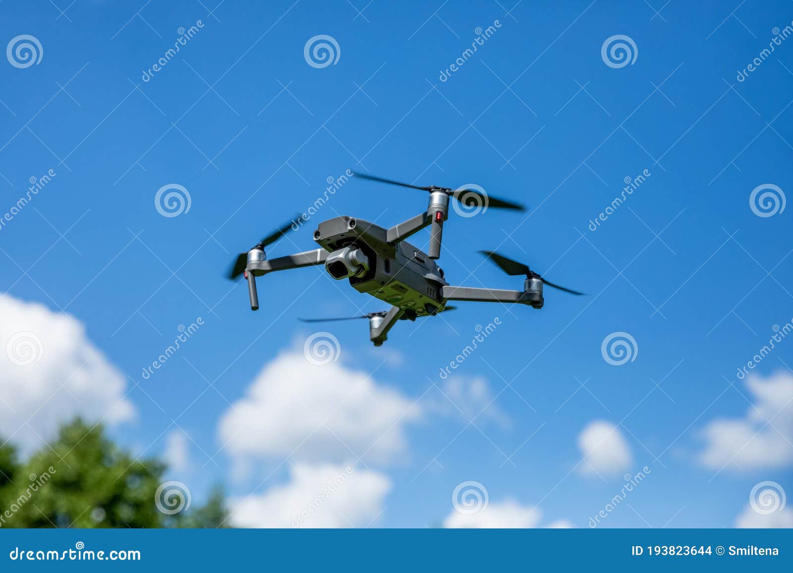 Drone quadcopter in flight stock photo. Image of aircraf - 193823644