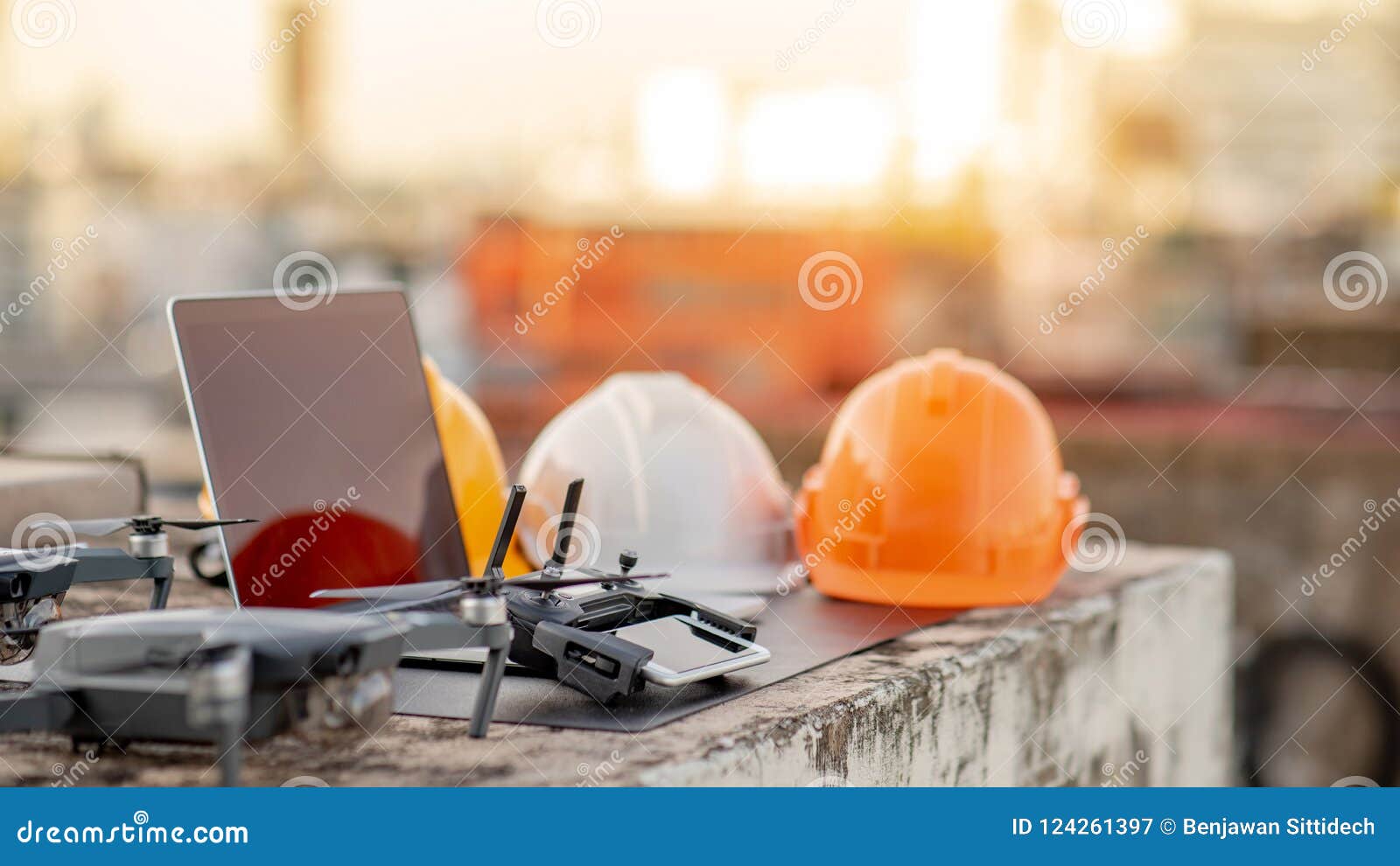 Drone, Remote Control, Laptop and Helmet at Construction Site Stock ...