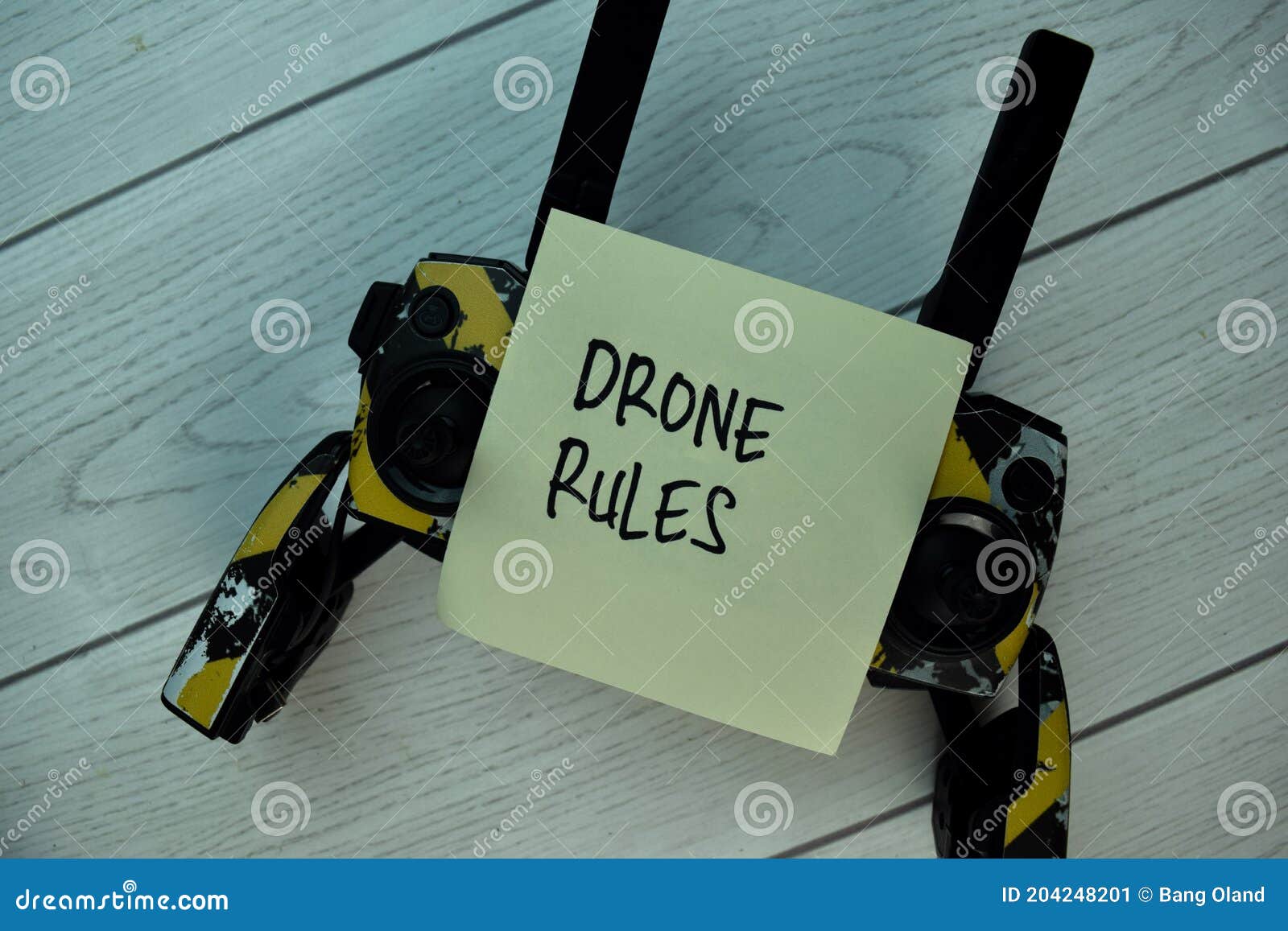 Drone Rules Write on Sticky Notes Isolated on Wooden Table Stock Image ...