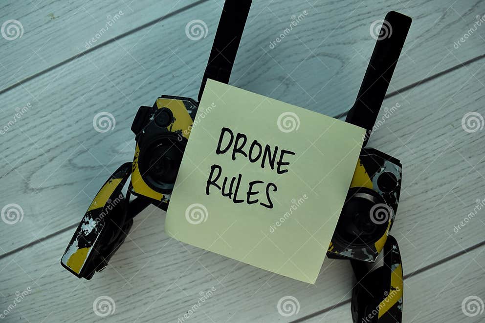 Drone Rules Write on Sticky Notes Isolated on Wooden Table Stock Image ...