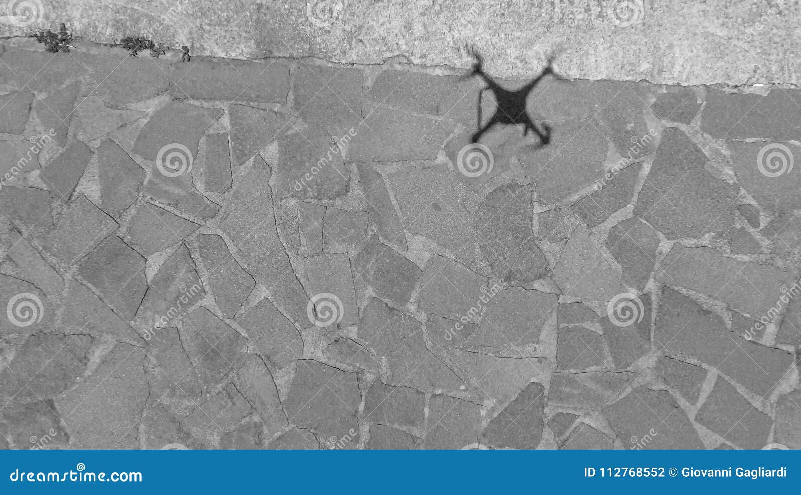 Drone Shadow on the Ground, Downward Aerial View Stock Photo - Image of ...