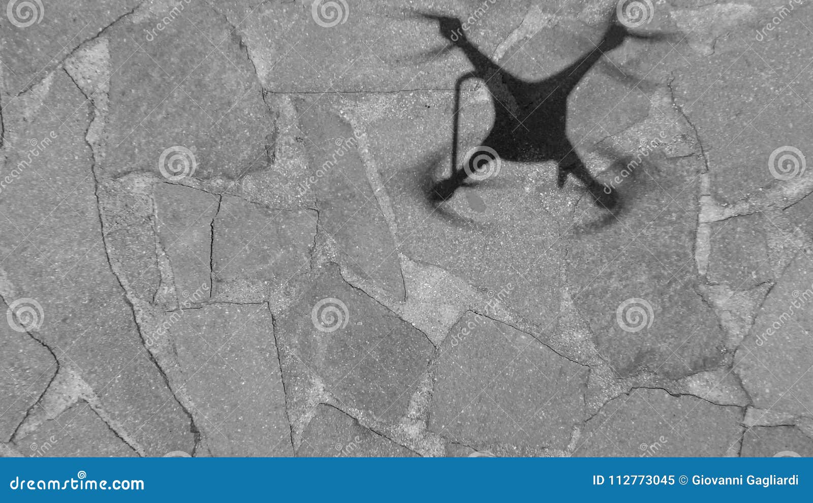 Drone Shadow on the Ground, Downward Aerial View Stock Image - Image of ...