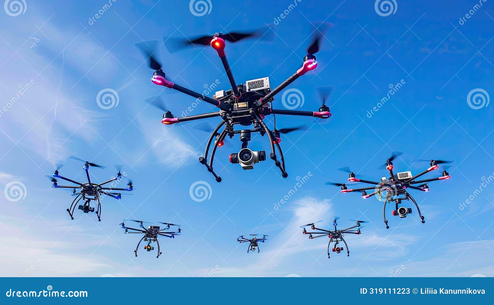 A Drone Swarm, Including a Small UAV, As they Gather Intelligence in ...