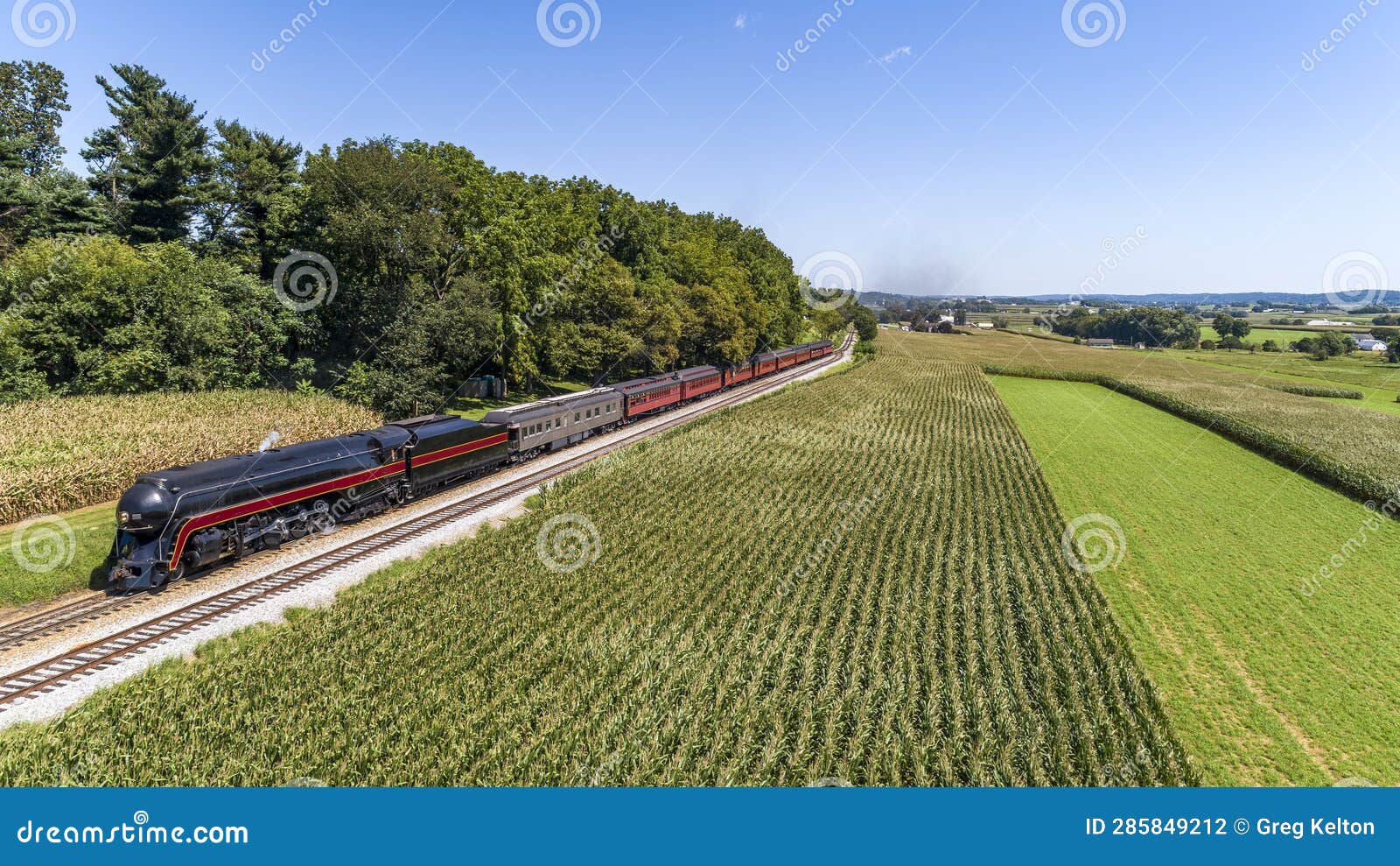 Drone View of an Antique Streamlined Steam Passenger Train Passing Thru ...