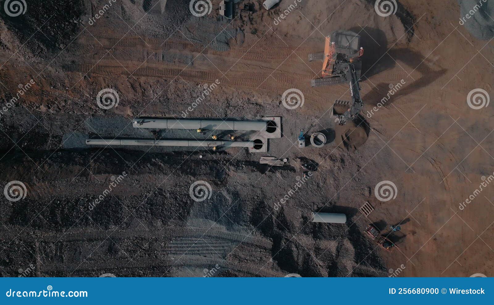 Drone View of an Excavator on a Construction Site Moving Soil Stock ...