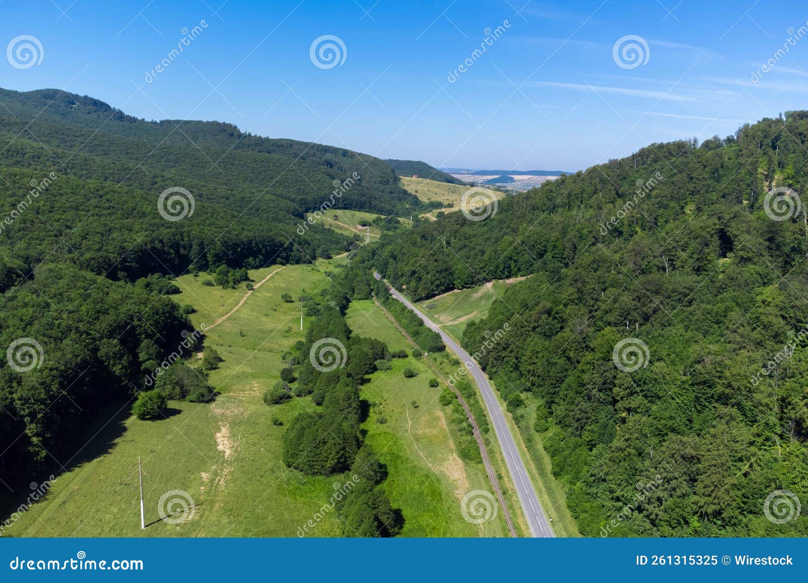 Drone View of a Road among Green Hills and Forests Stock Image - Image ...
