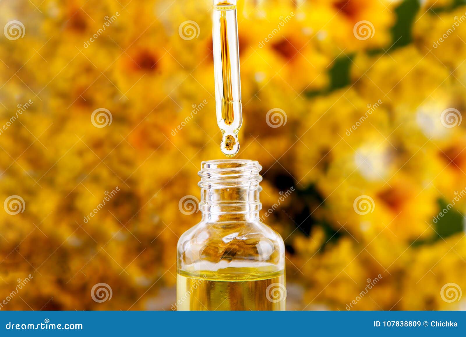 Drop Falling from Dropper of Essential Oil, Aromatherapy Essence, or ...