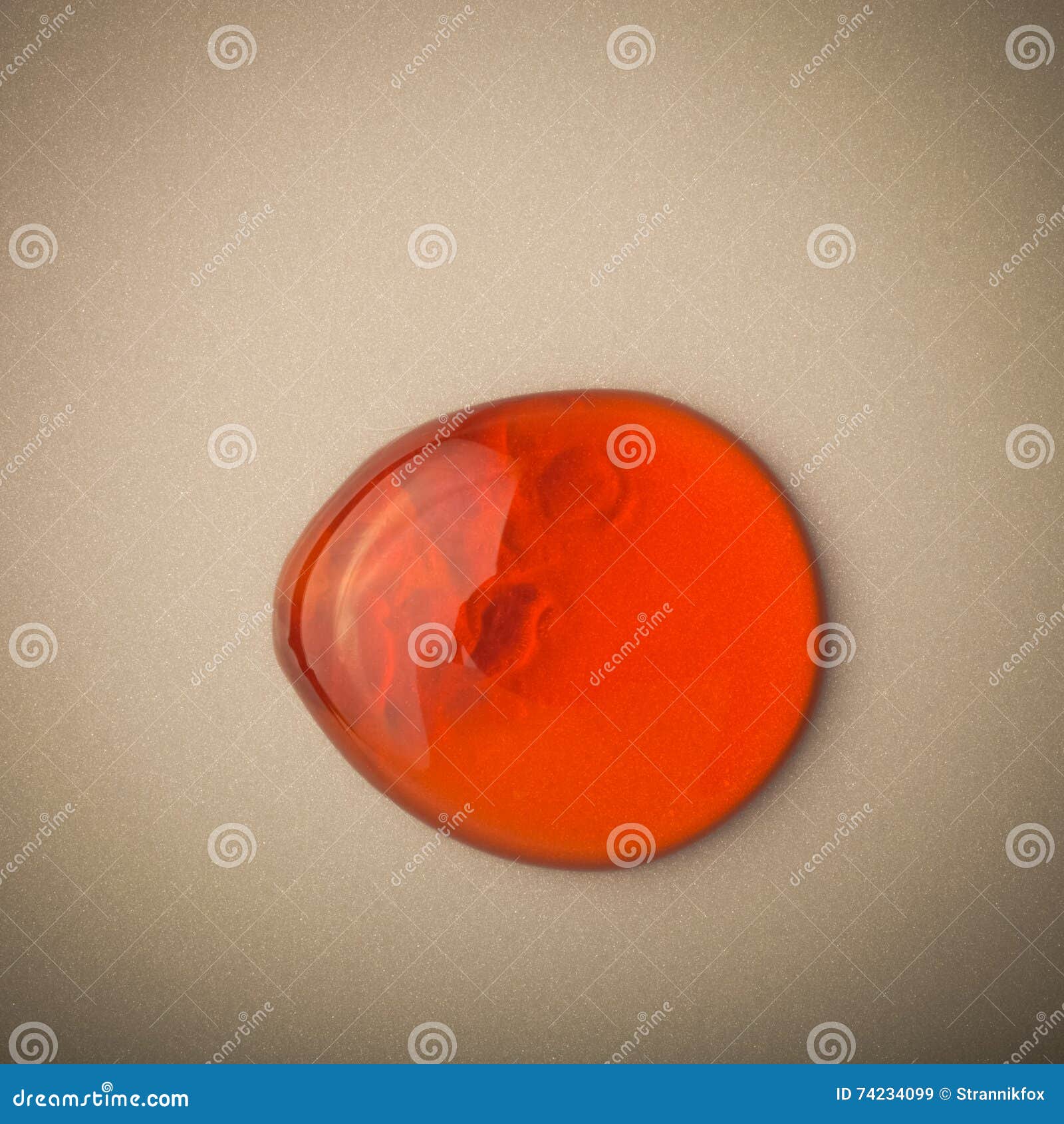 Drop of Food Coloring on a Light Background. Toned Stock Image - Image ...
