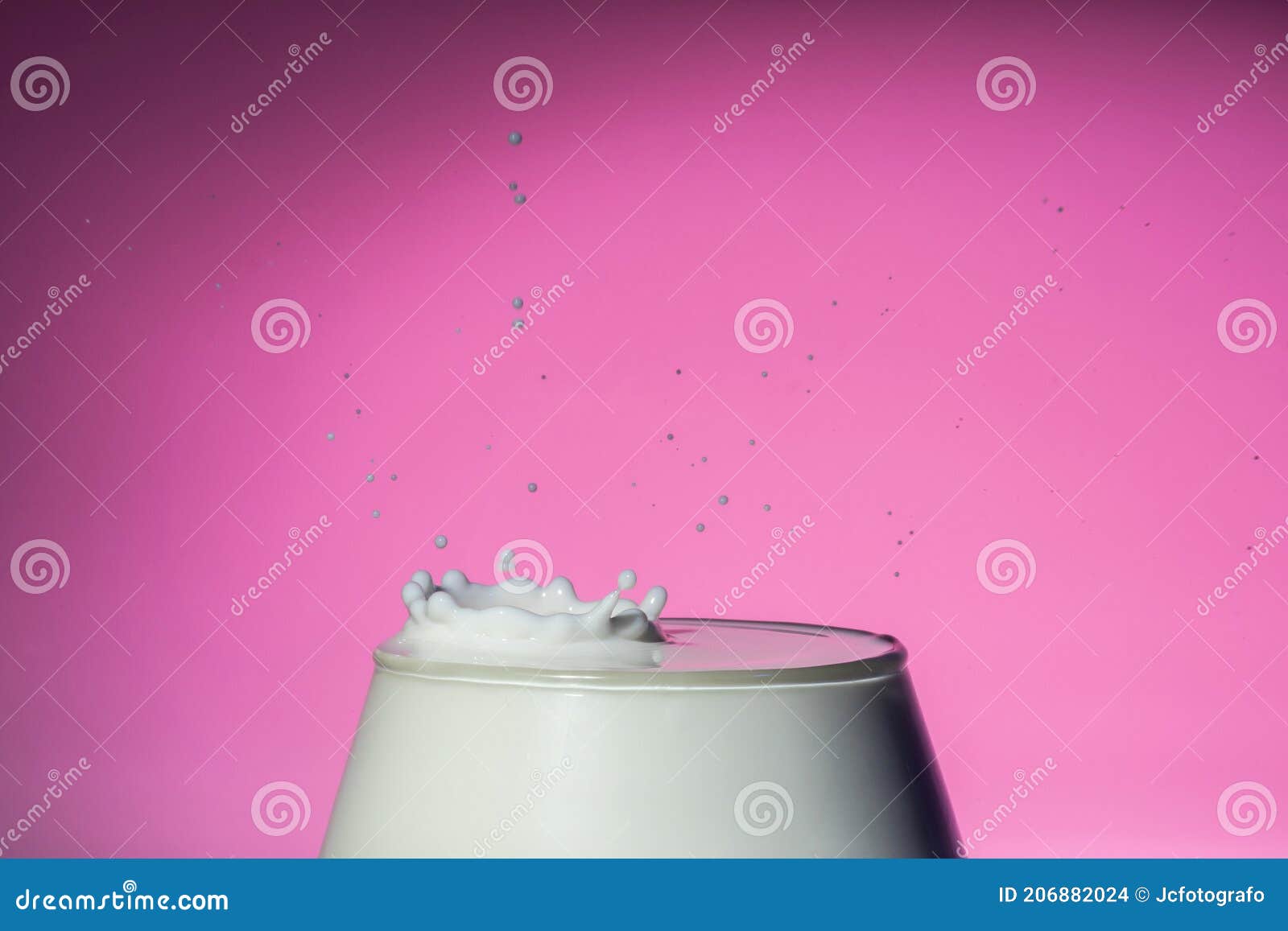 Milk drop splash falling stock photo. Image of clean - 206882024