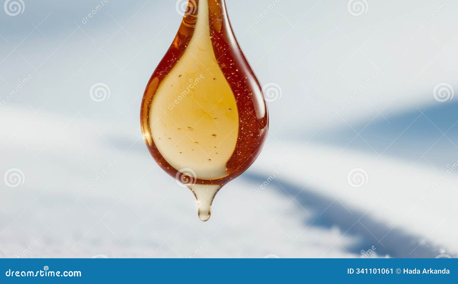 A Drop of Honey Glistening on White Background, Capturing Its Rich ...
