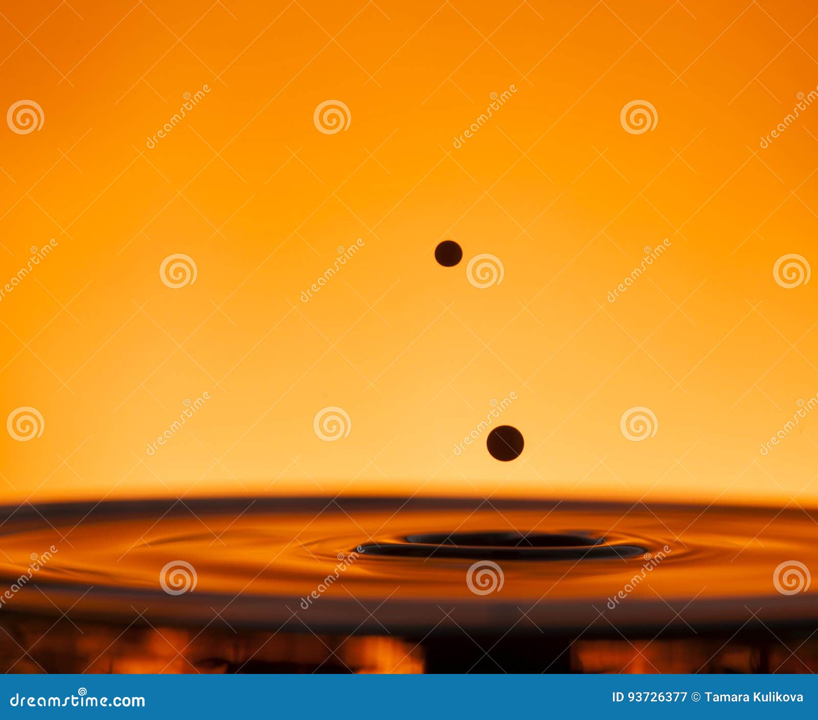 Drop of ink falling stock image. Image of rounded, glow - 93726377
