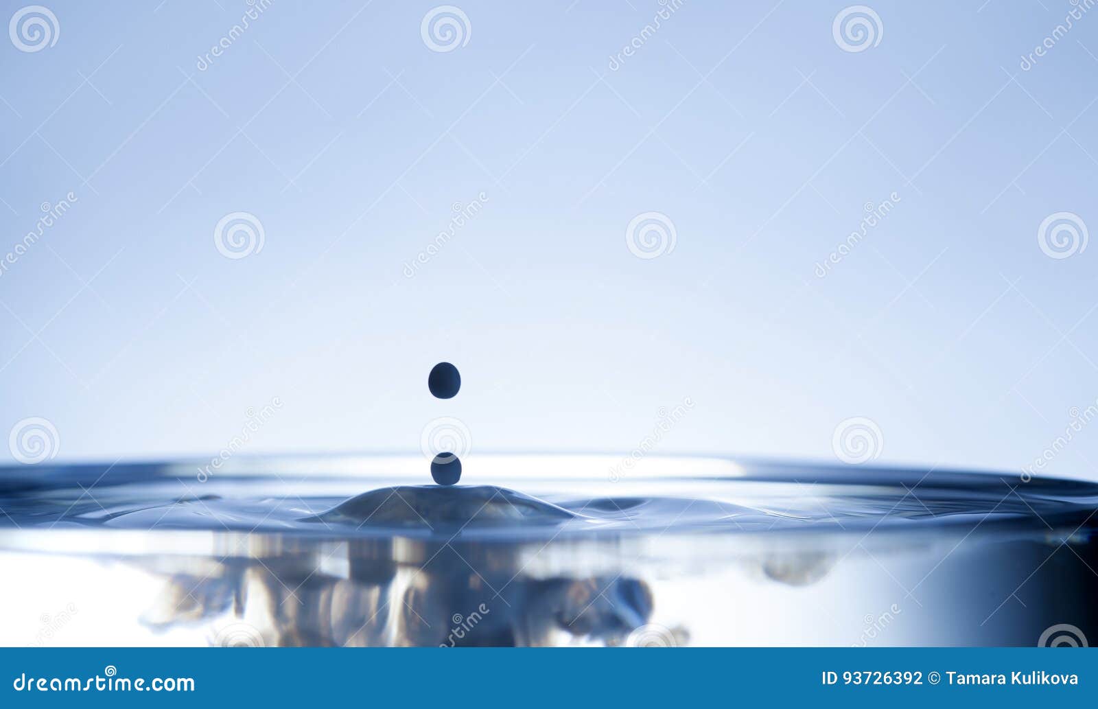 Drop of ink falling stock photo. Image of cold, drop - 93726392