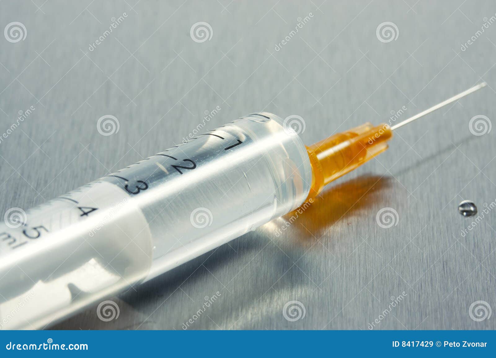 Drop Of A Liquid On A Needle Of A Syringe Picture. Image: 8417429