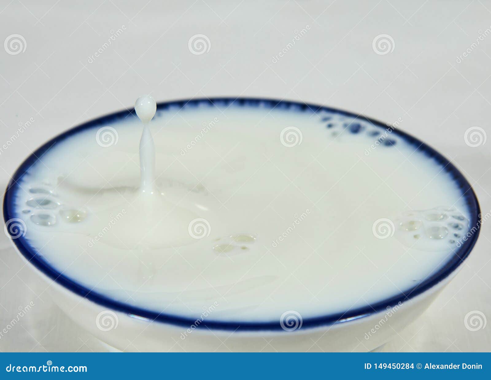 A Drop of Milk or a White Drop of Liquid in a Bowl Stock Photo - Image ...