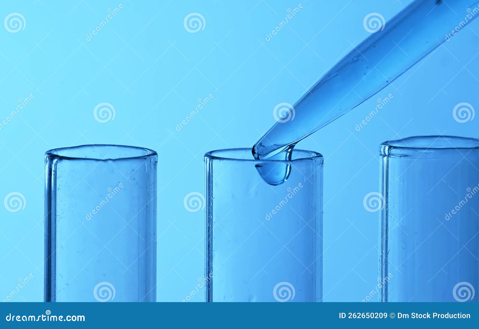Drop from Pipette Drips into Test Tubes Stock Image - Image of ...
