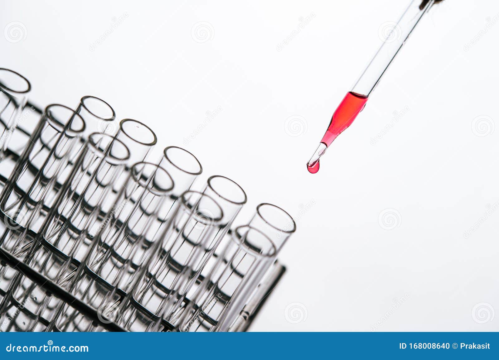 Drop the Red Chemicals into the Beaker Stock Photo - Image of chemist ...
